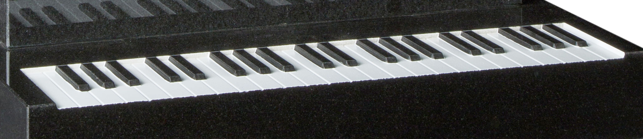 carved keyboard headstone - Churchill Memorials – Custom Headstones ...