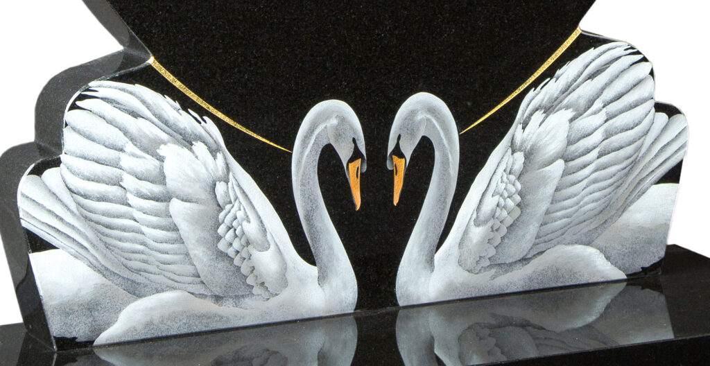 Two swans together throughout life decorate this memorial. - Churchill ...